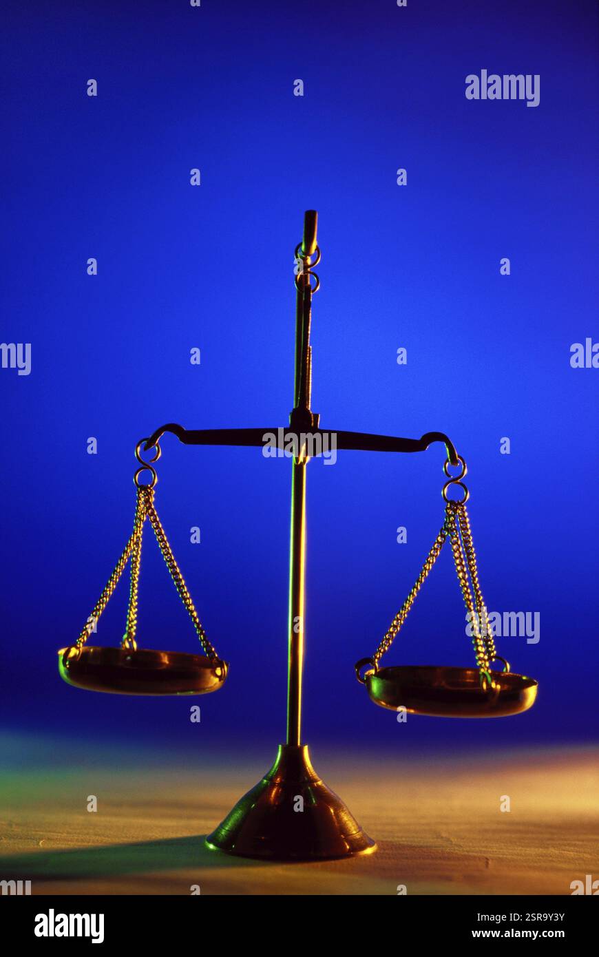 Concept, balance weight scale against blue background Stock Photo - Alamy
