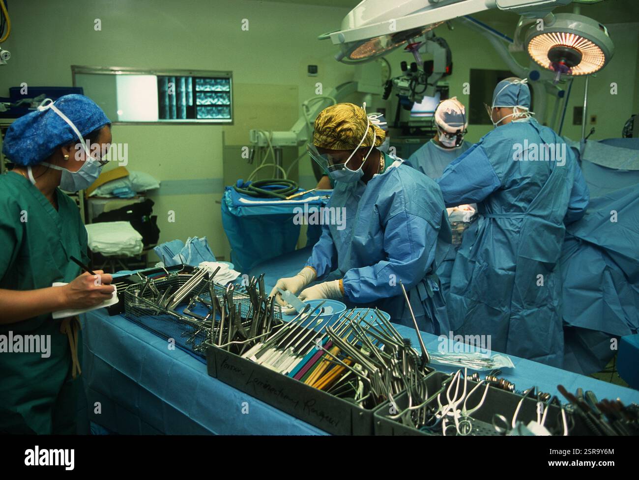 Neurosurgery procedure to remove bone chips from between the vertebrae ...