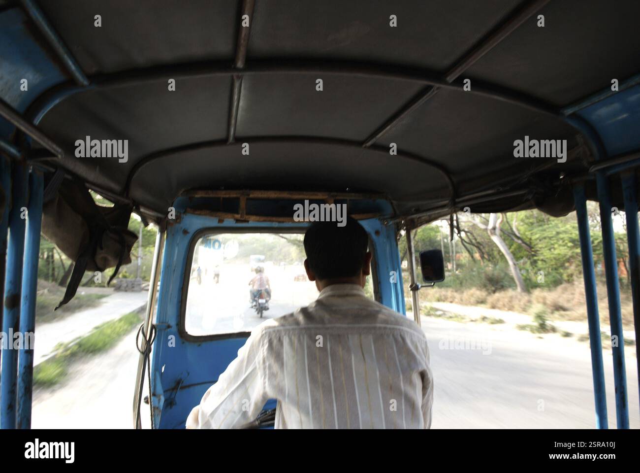 Blue auto rickshaw driver in Chandigarh, India Union Territory Stock ...