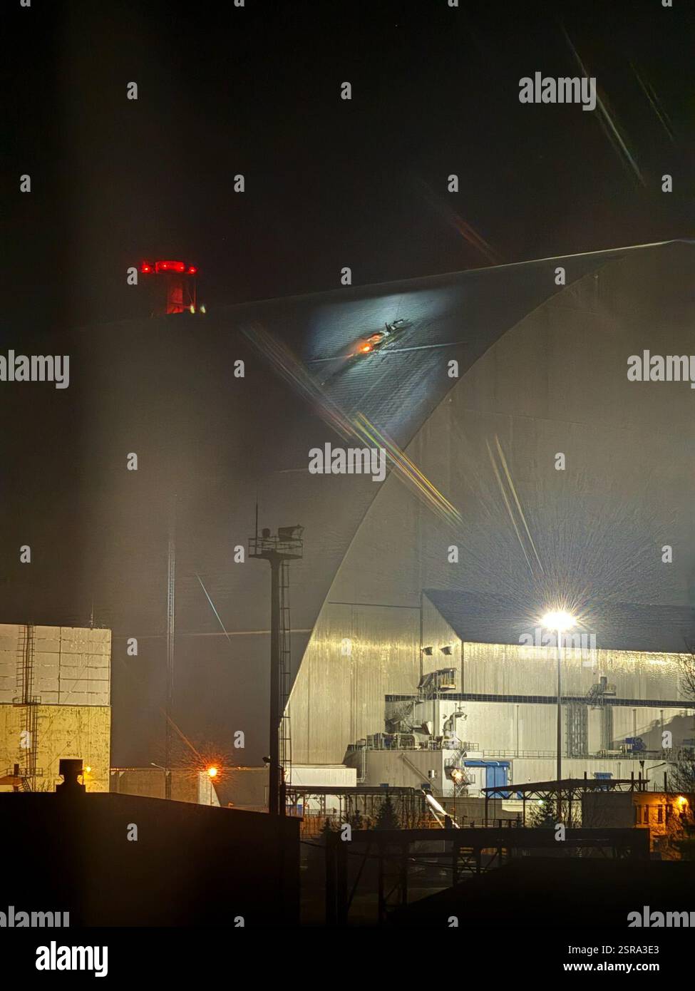 Russian drone attack on the Chornobyl Nuclear Plant. Fire is seen ...