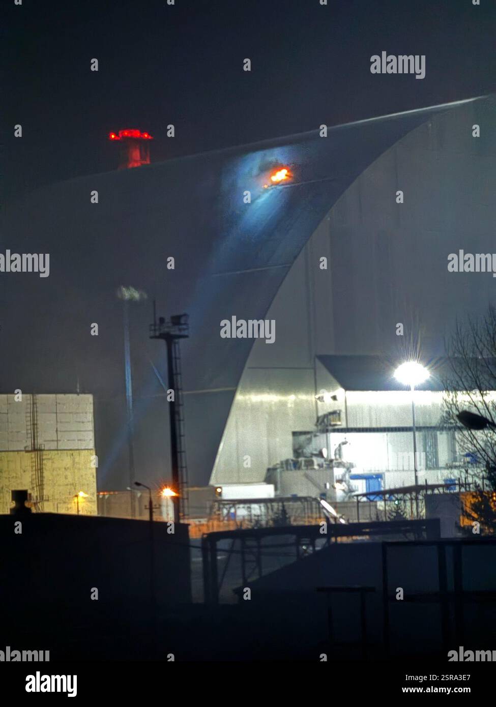 Russian drone attack on the Chornobyl Nuclear Plant. Fire is seen ...