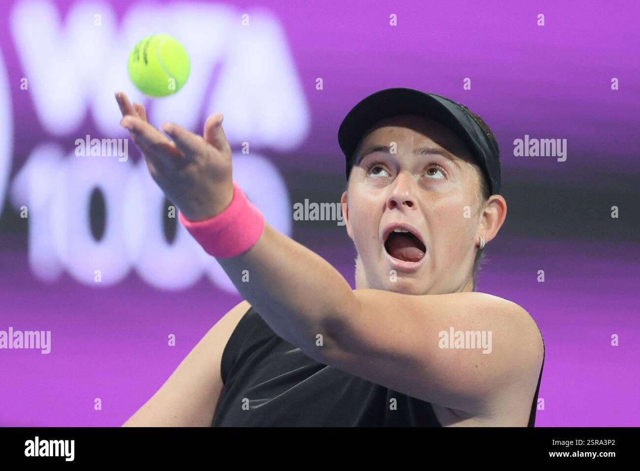 Latvia's Jelena Ostapenko serves to Amanda Anisimova of the United ...