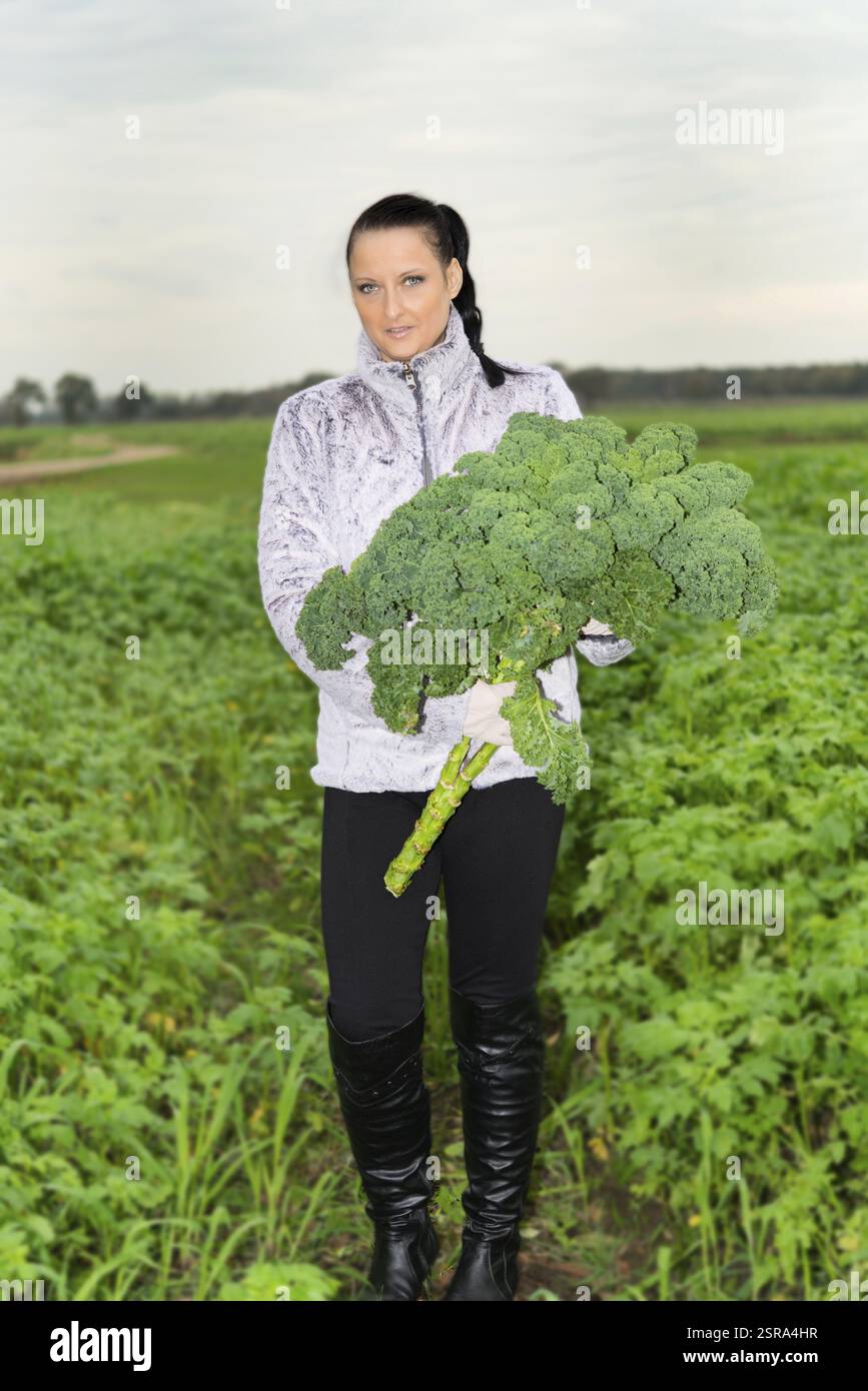 Woman borecole hi-res stock photography and images - Alamy