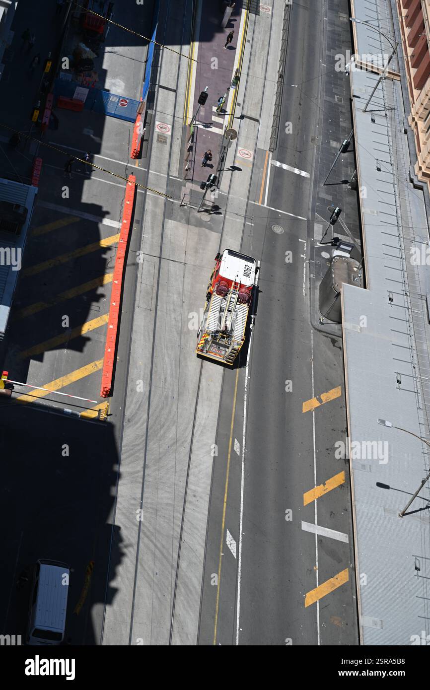 aerial view of Fire Rescue Victoria fire engine traveling to an ...