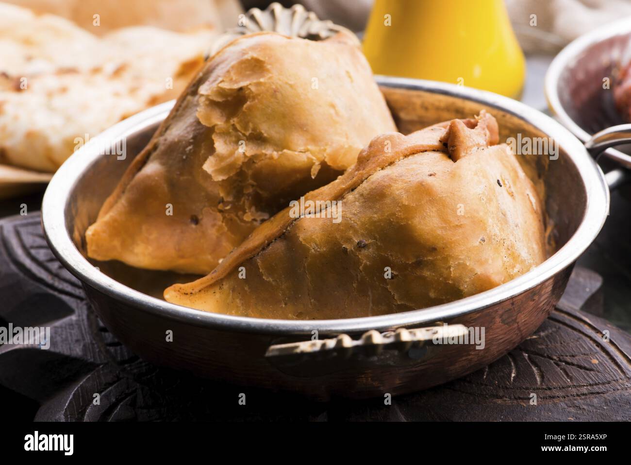 Veg Samosa - is a crispy and spicy Indian triangle shape snack Stock ...