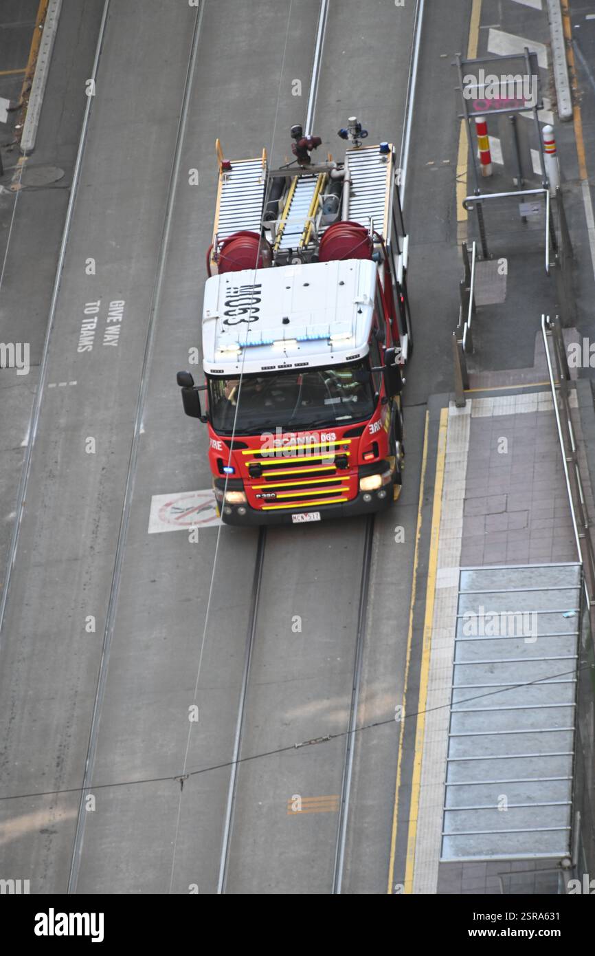 aerial view of Fire Rescue Victoria fire engine traveling to an ...