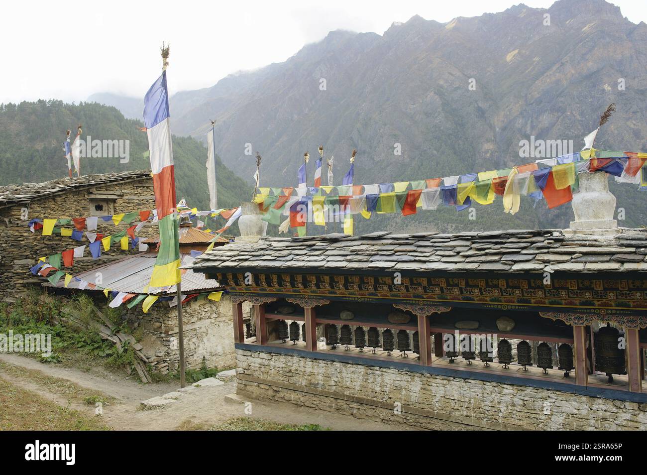 Prayer wheel monastery in upper pisang, Nepal, Asia Stock Photo - Alamy