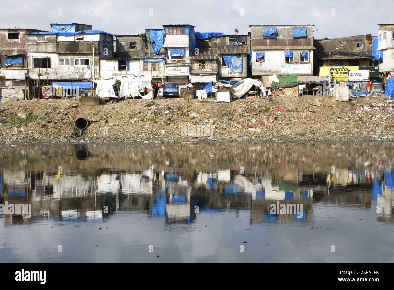 Bharat Nagar slum reflected in mithi river, Bandra, Bombay Mumbai ...