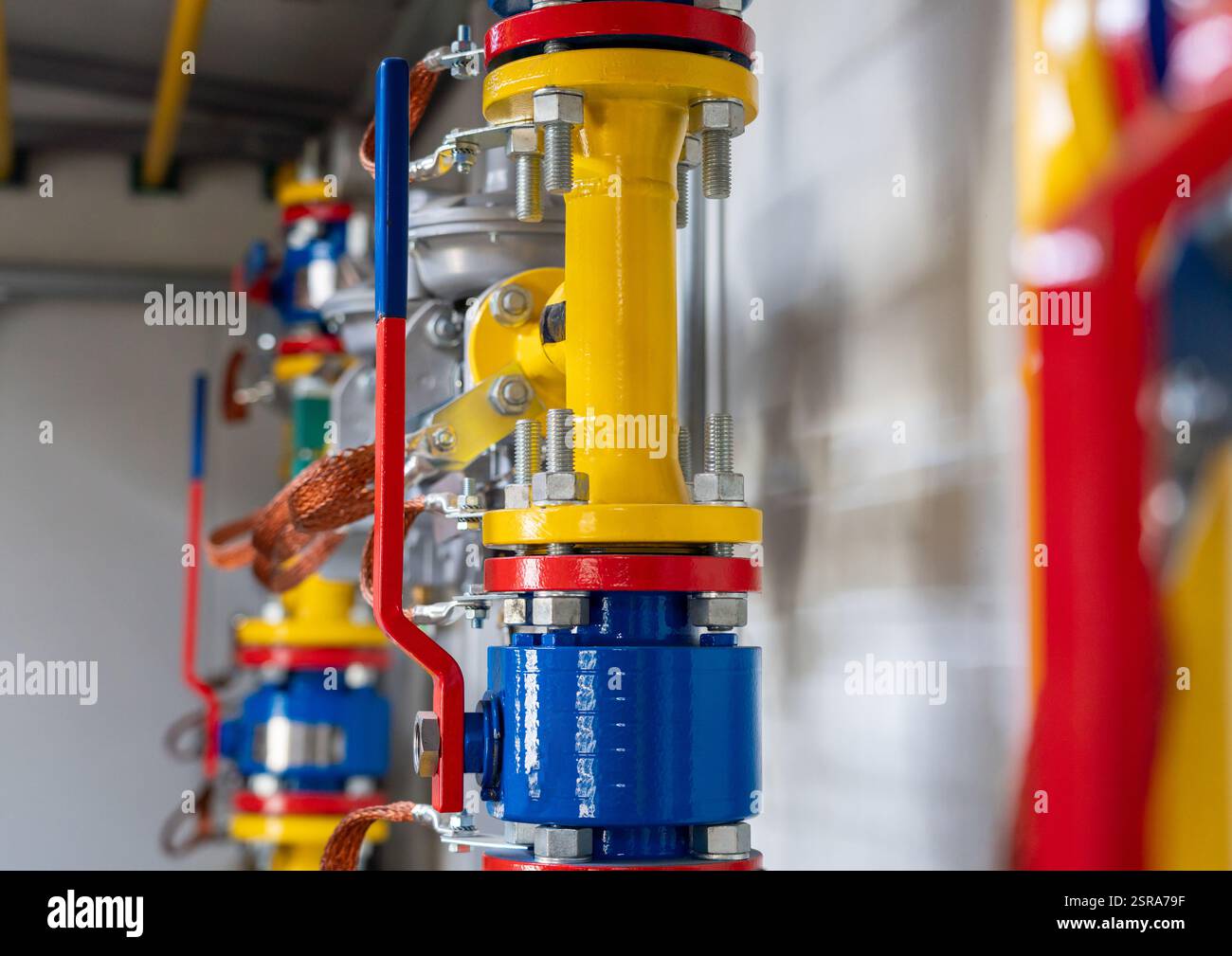Industrial natural gas pipeline system with colorful valves ensuring ...