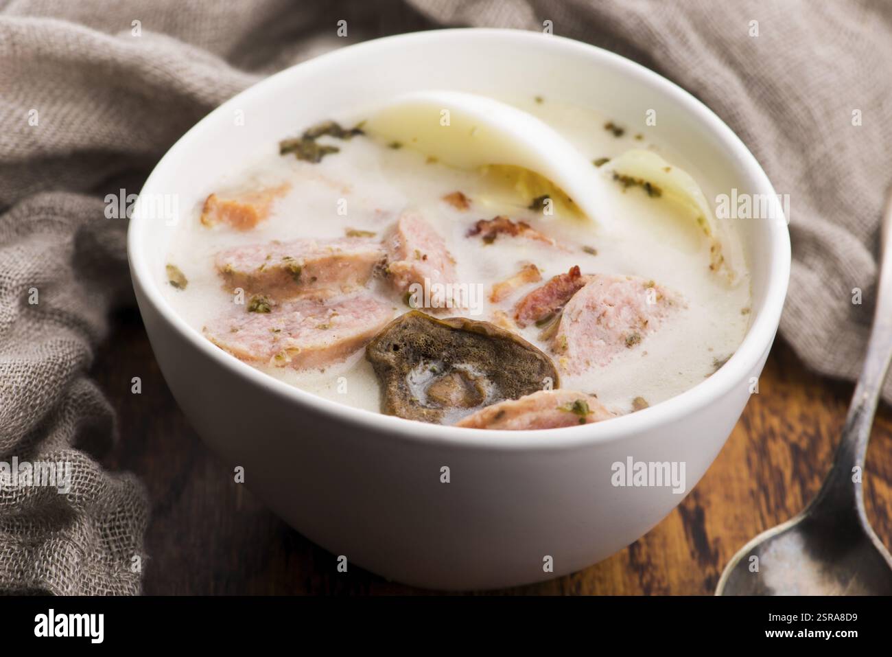 Traditional easter white borscht with eggs and sausage Stock Photo - Alamy