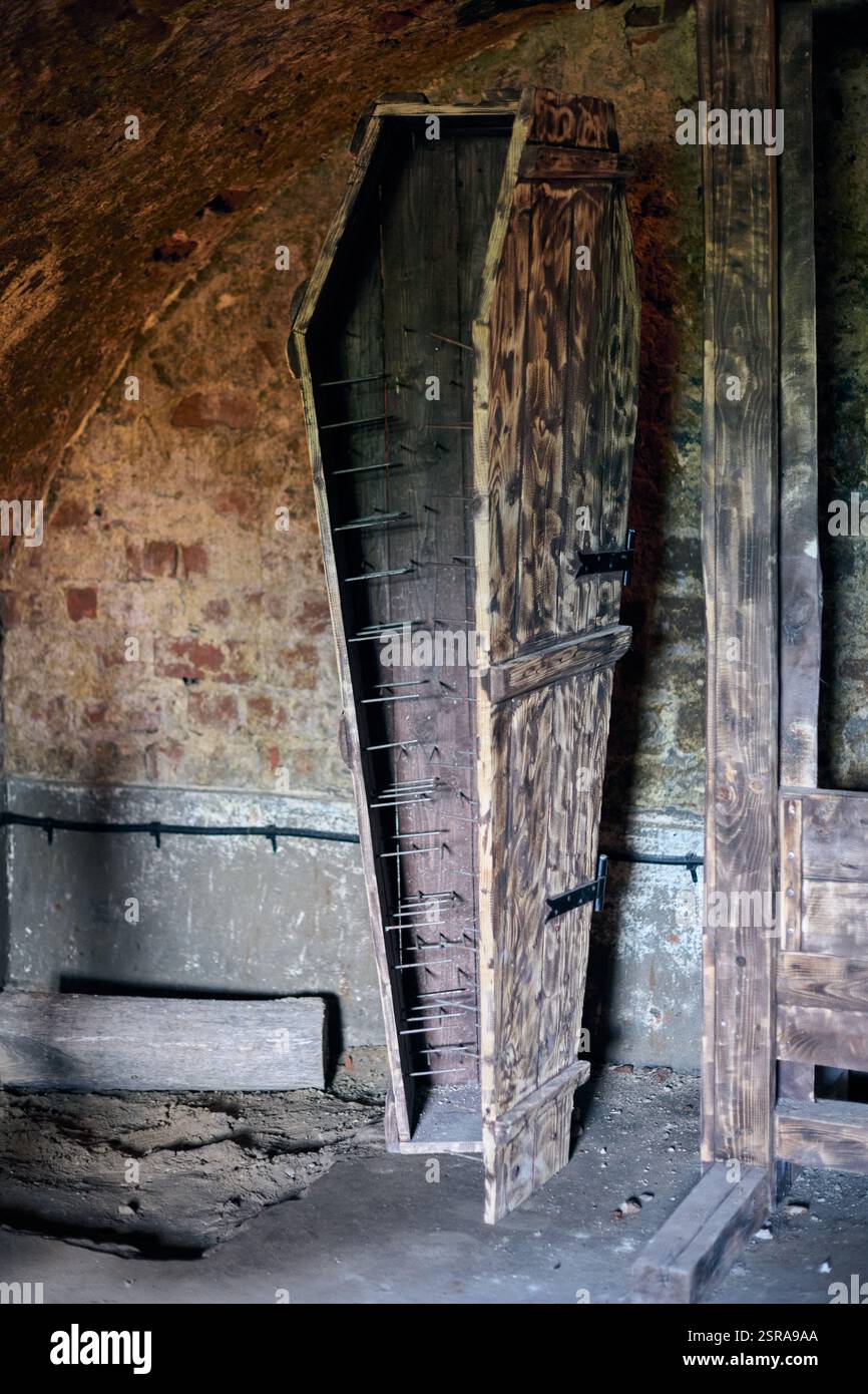 Wooden iron maiden medieval torture device like coffin cabinet with a ...