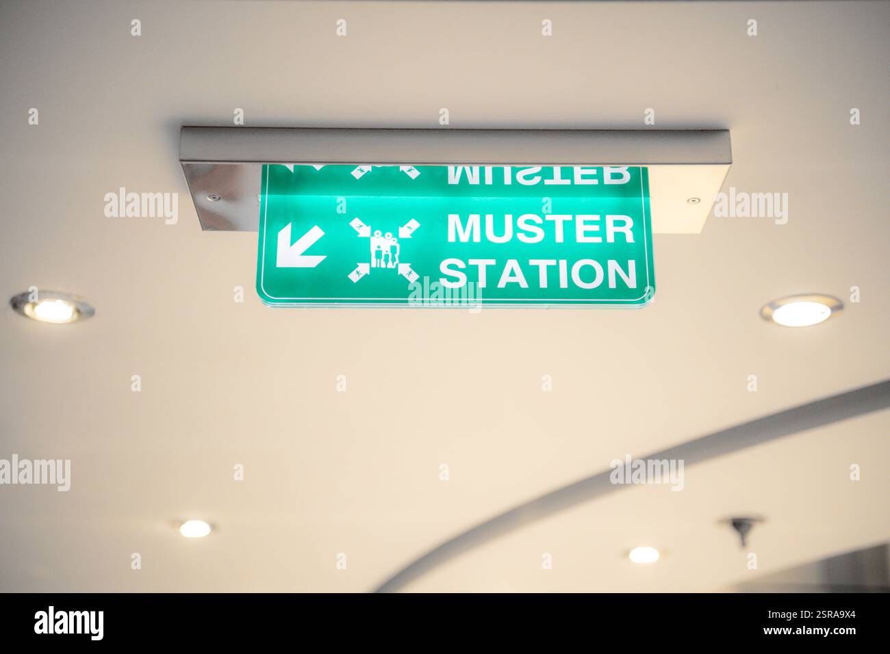 Emergency exit sign on the wall of a shopping mall, vintage tone Stock ...