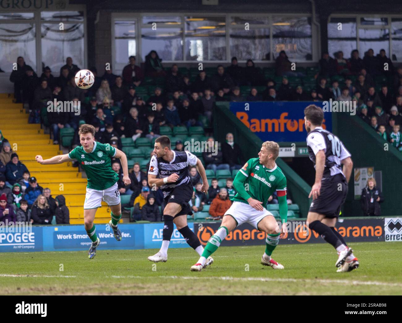 James Plant of Yeovil Town heads ball toward Wealdstone goal during the ...