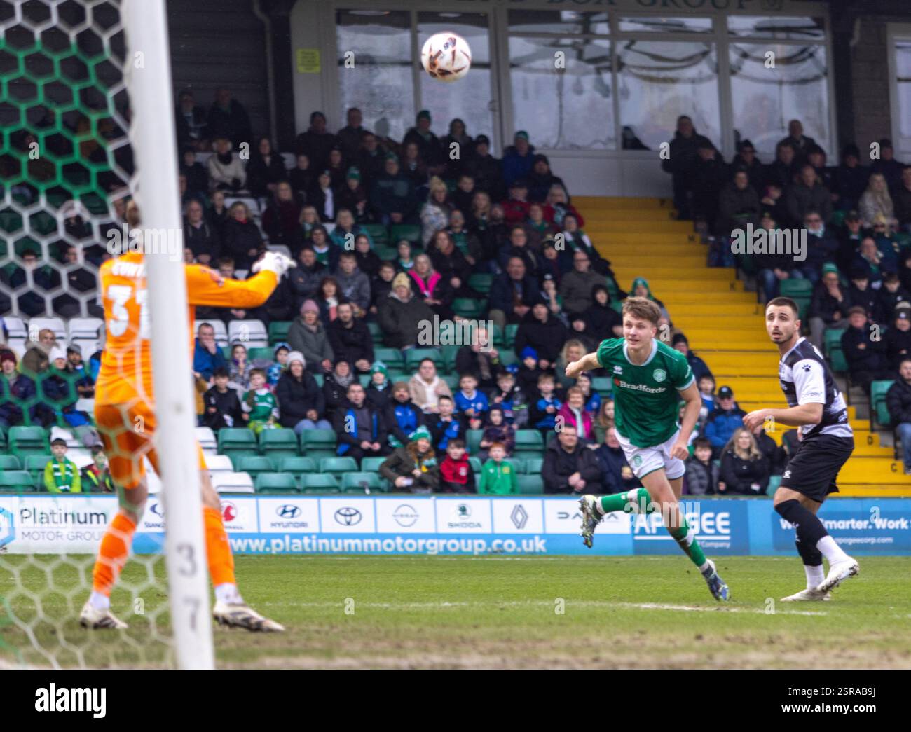 James Plant of Yeovil Town heads ball toward Wealdstone goal keeper ...