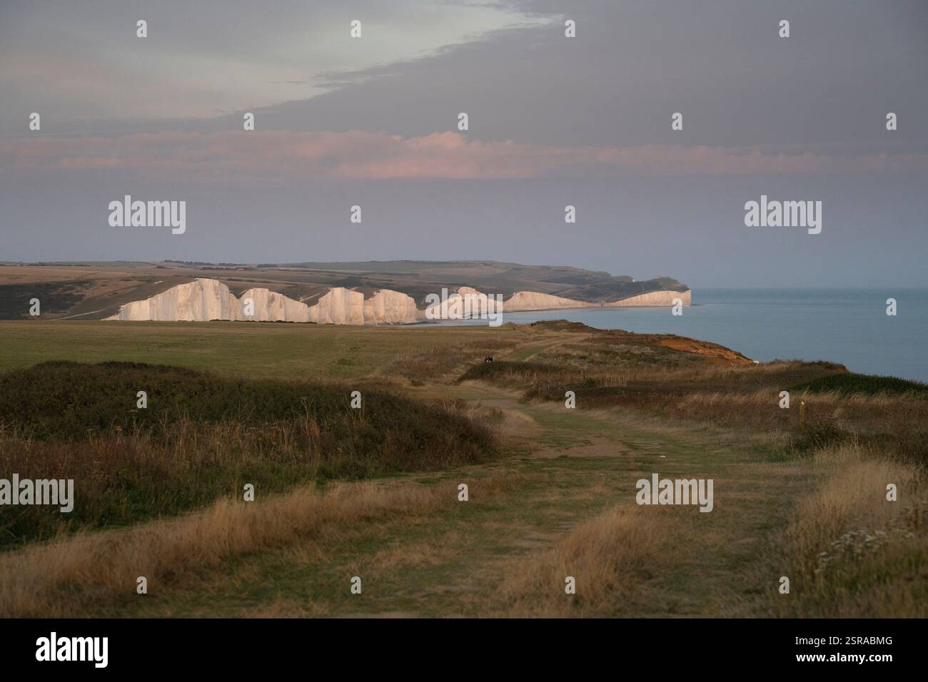 The iconic White Cliffs of Seven Sisters, England, are seen at sunset ...