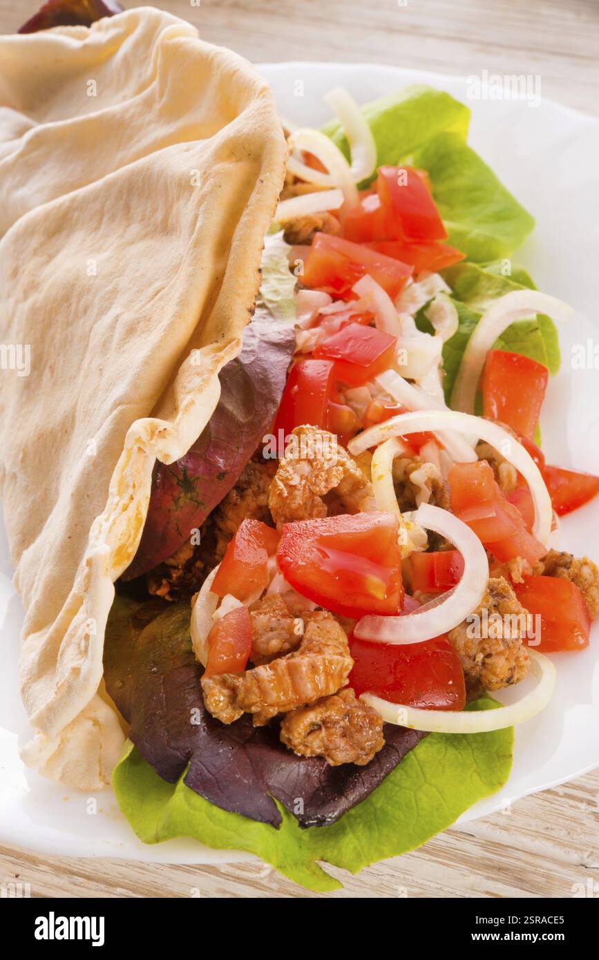 Kebab - grilled meat, bread and vegetables Stock Photo - Alamy