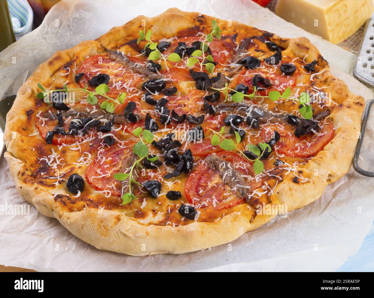 Olive anchovy pizza Stock Photo - Alamy