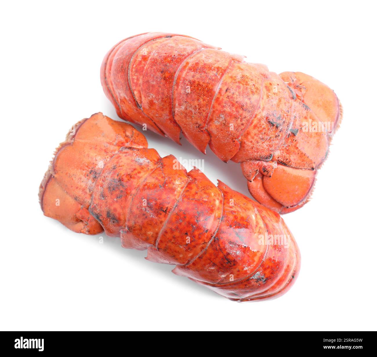 Tails of boiled lobsters isolated on white, top view Stock Photo - Alamy