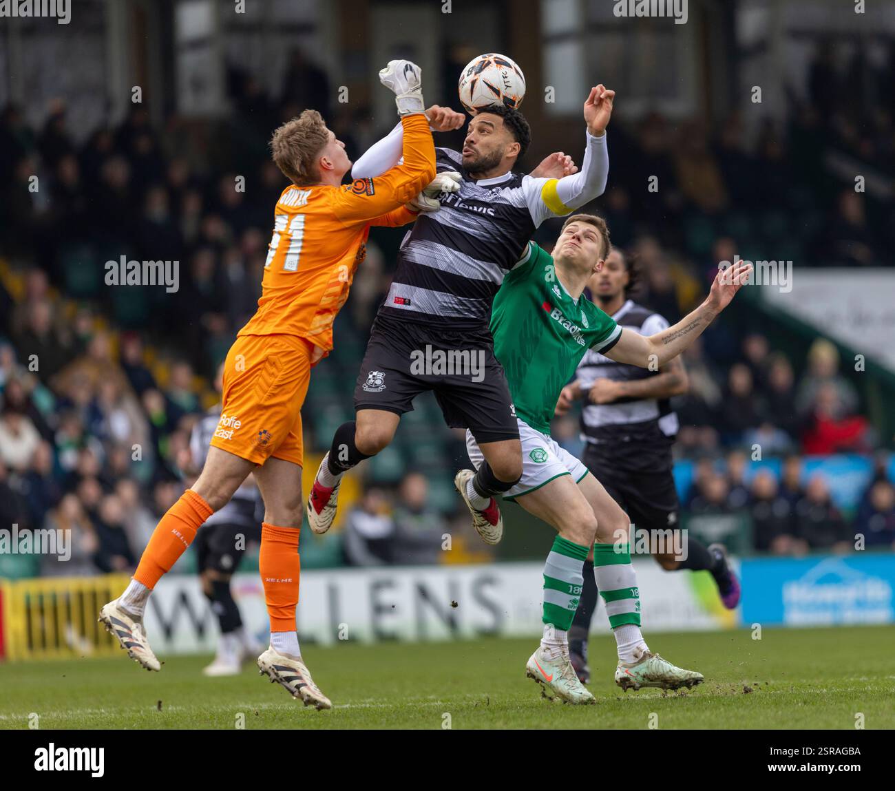Ciaran McGuckin of Yeovil Town and Luca Gunter keeper and captain ...