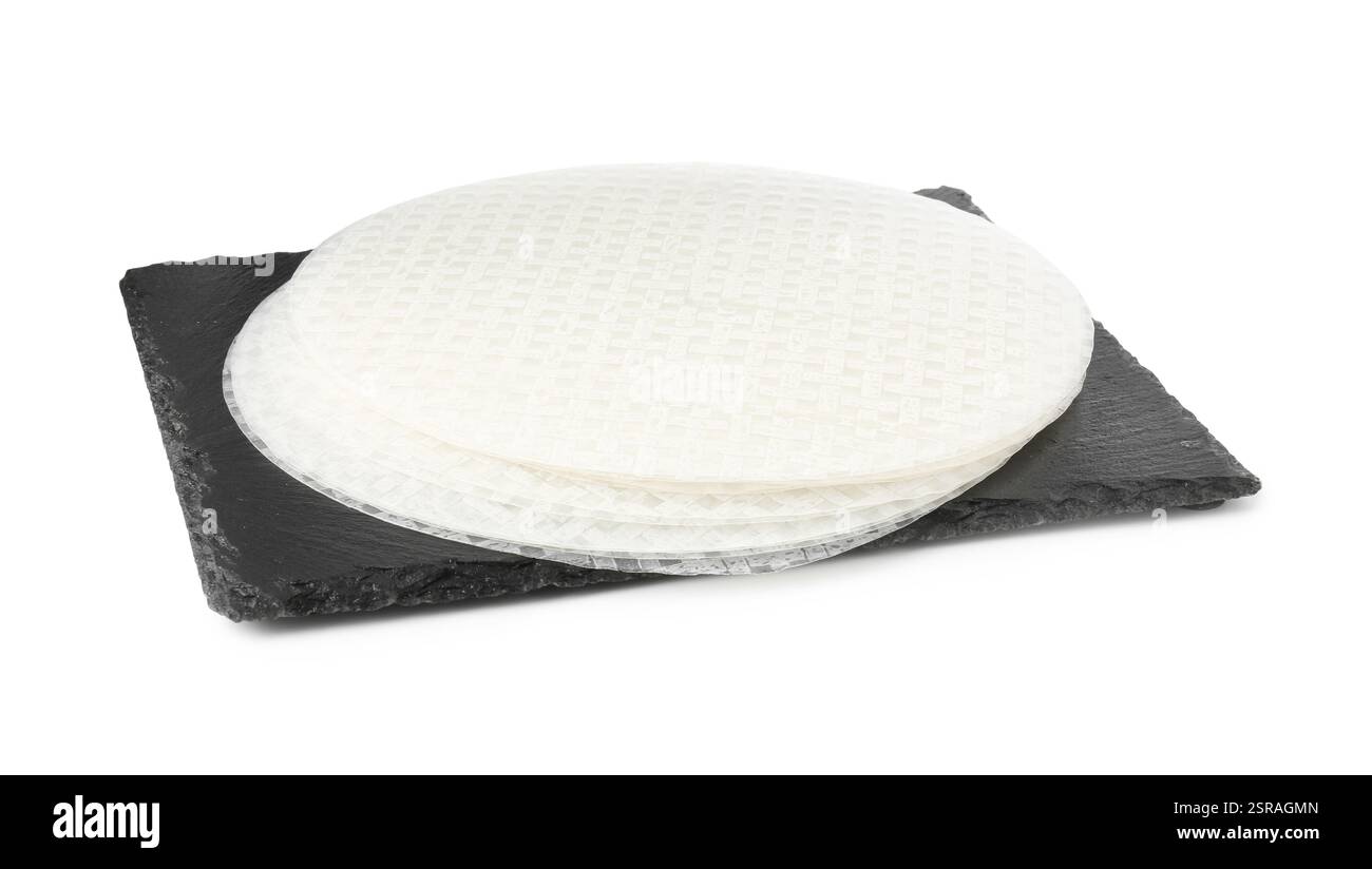 Stack of edible rice paper sheets isolated on white Stock Photo - Alamy