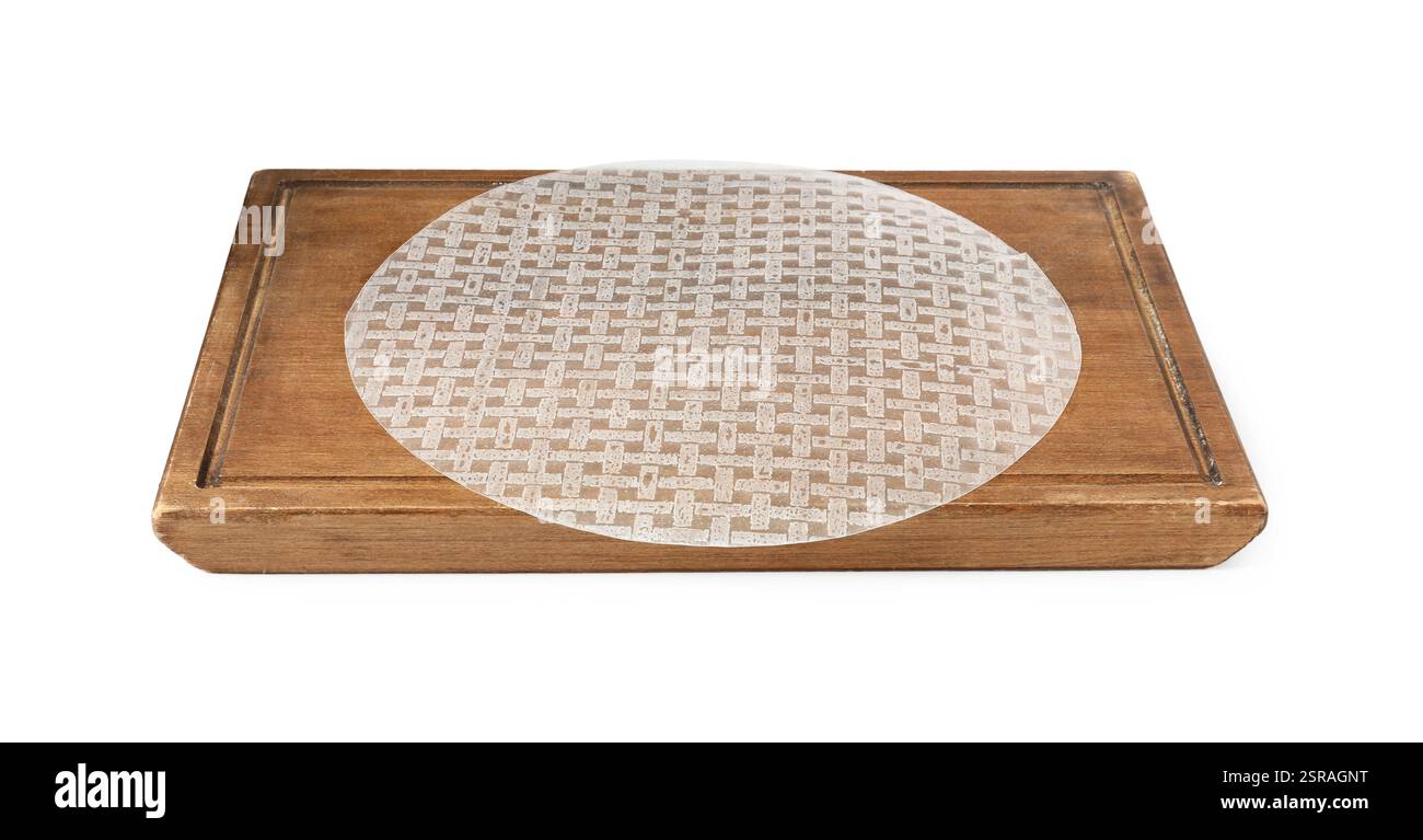 Edible rice paper sheet isolated on white Stock Photo - Alamy
