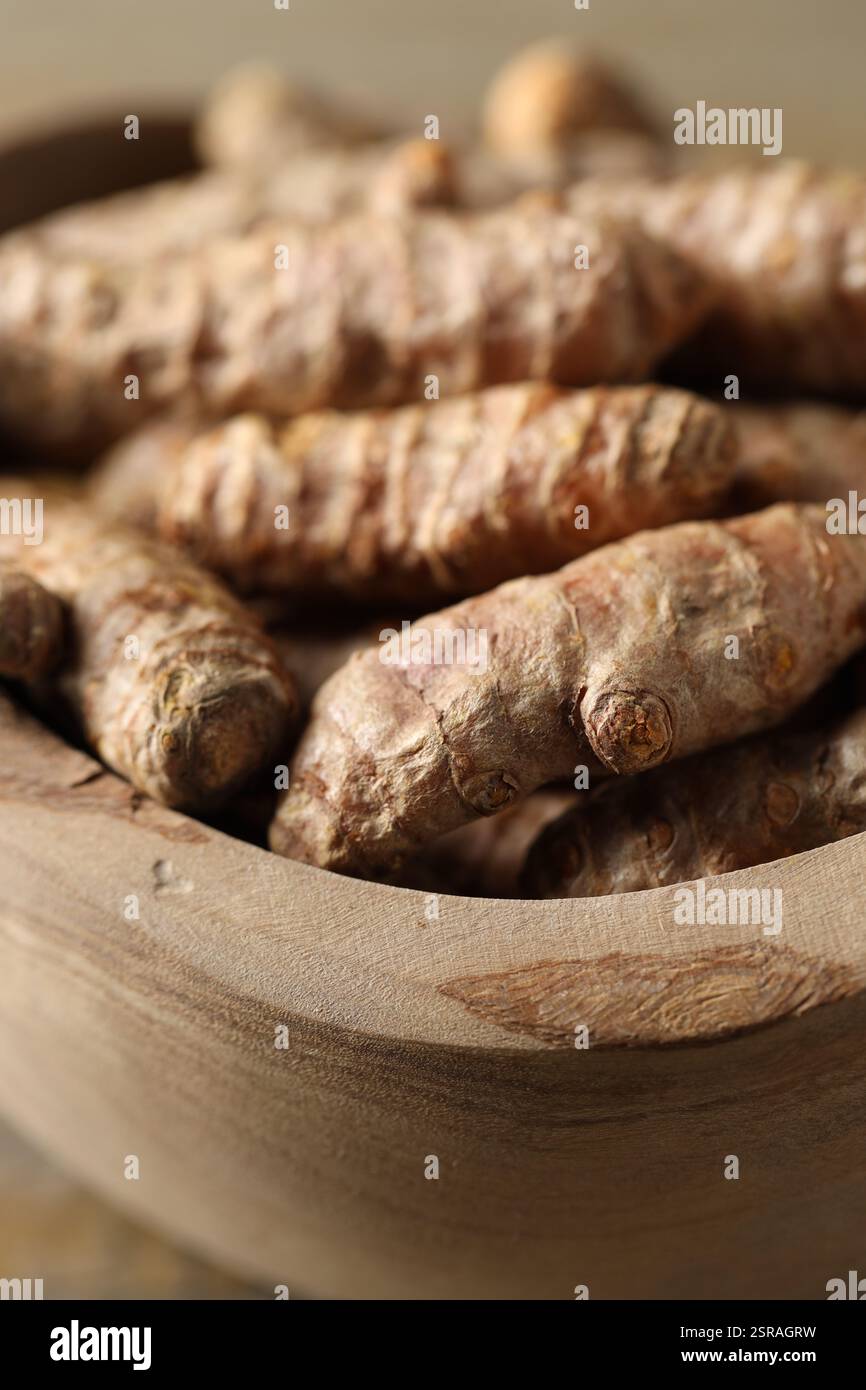 Whole turmeric in bowl hi-res stock photography and images - Alamy