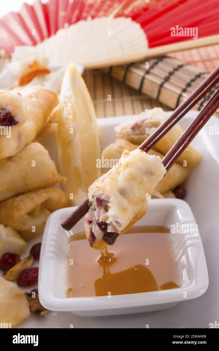 Sweet spring rolls Stock Photo - Alamy