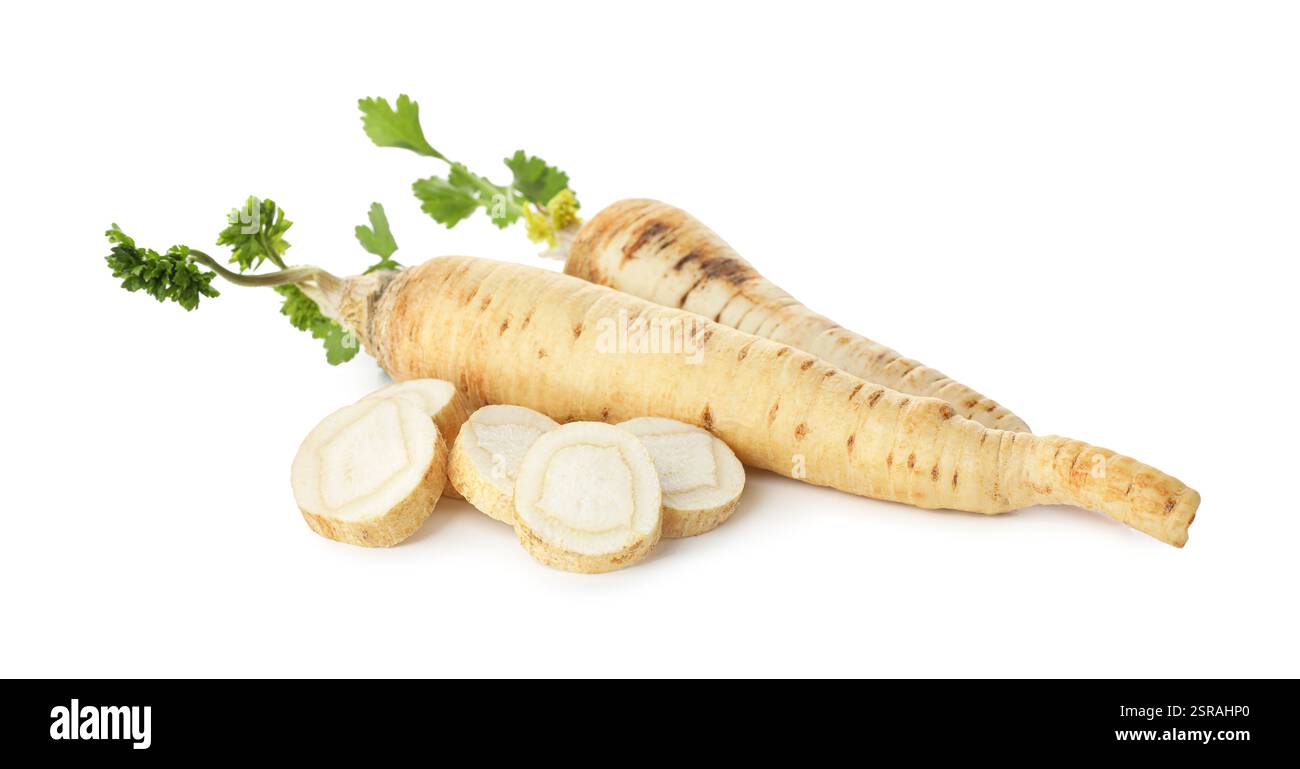 Whole and cut fresh parsley roots isolated on white Stock Photo - Alamy