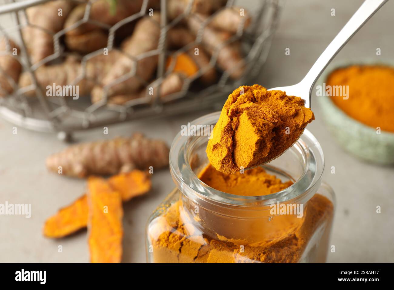 Taking aromatic turmeric powder hi-res stock photography and images - Alamy