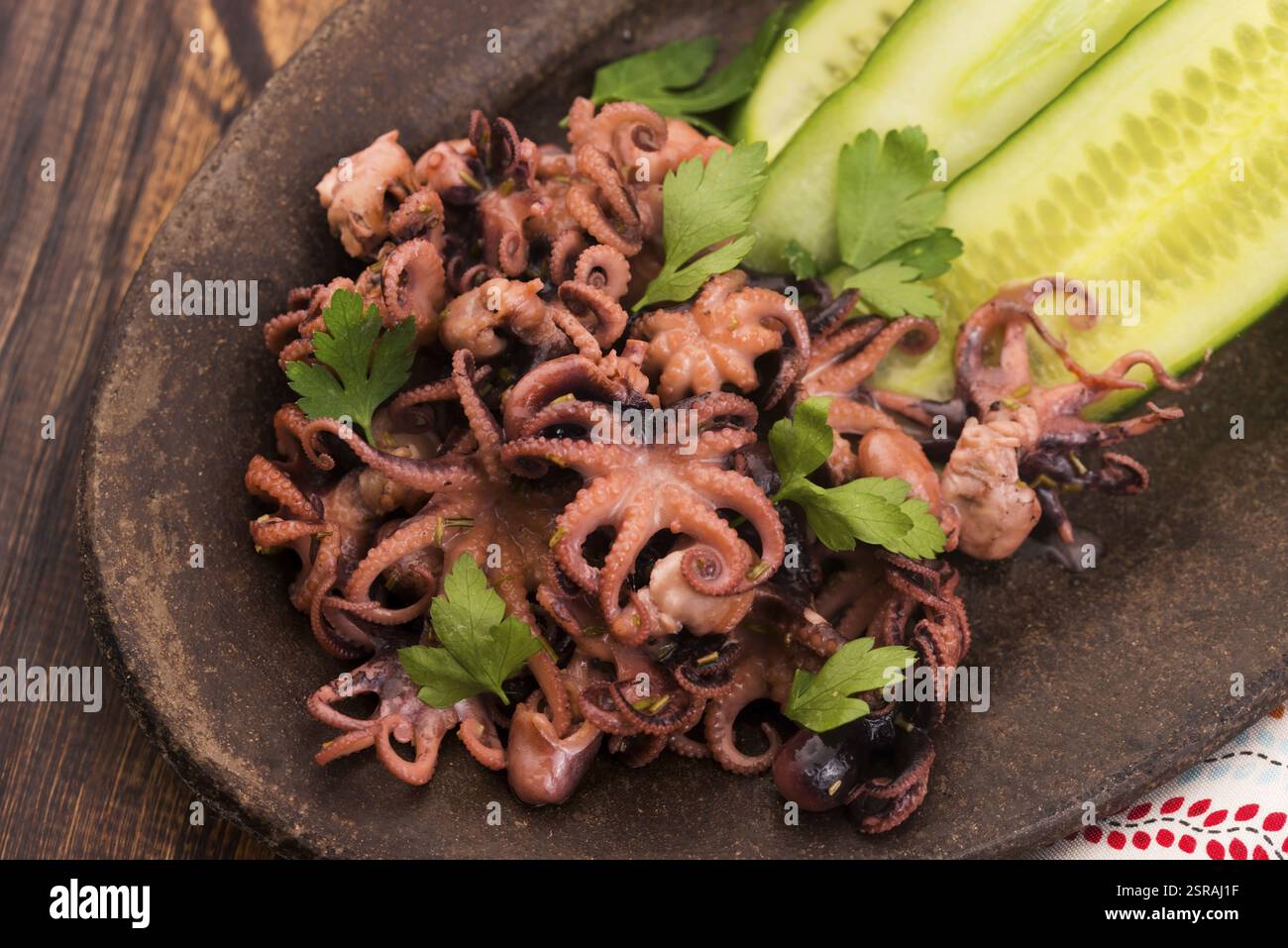 Octopus. Greek, eating Stock Photo - Alamy