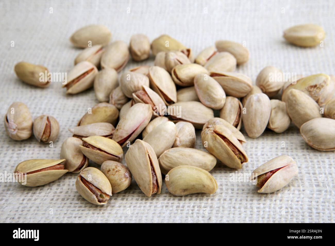 Dry roasted salted pistachio nuts Stock Photo - Alamy