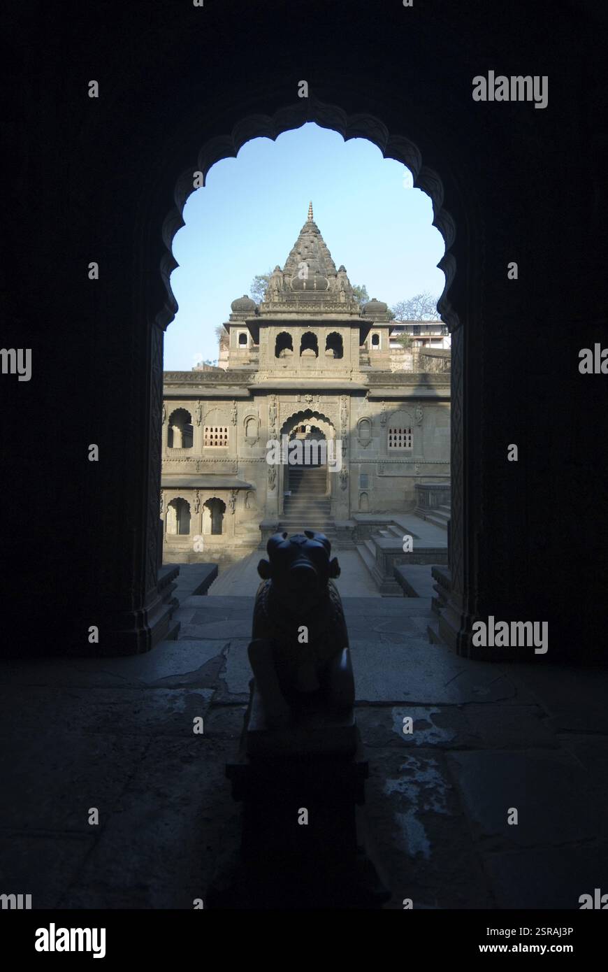 Maheshwar temple from the arch of chhatri at, Madhya Pradesh, India ...
