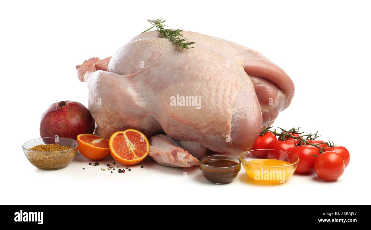 Whole raw turkey with ingredients isolated on white Stock Photo - Alamy