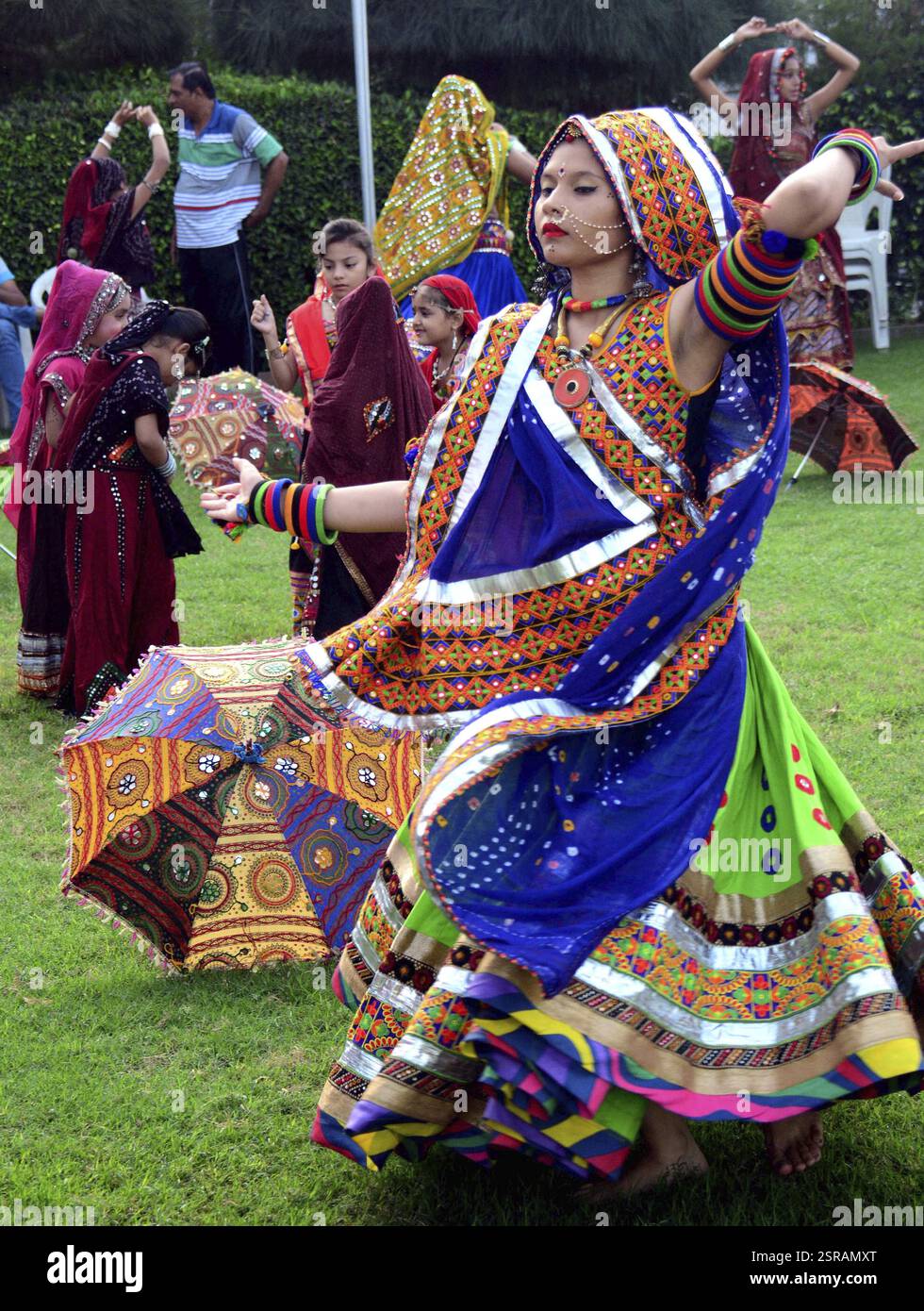 Indian girls practice the Garba dance steps in preparation for the ...
