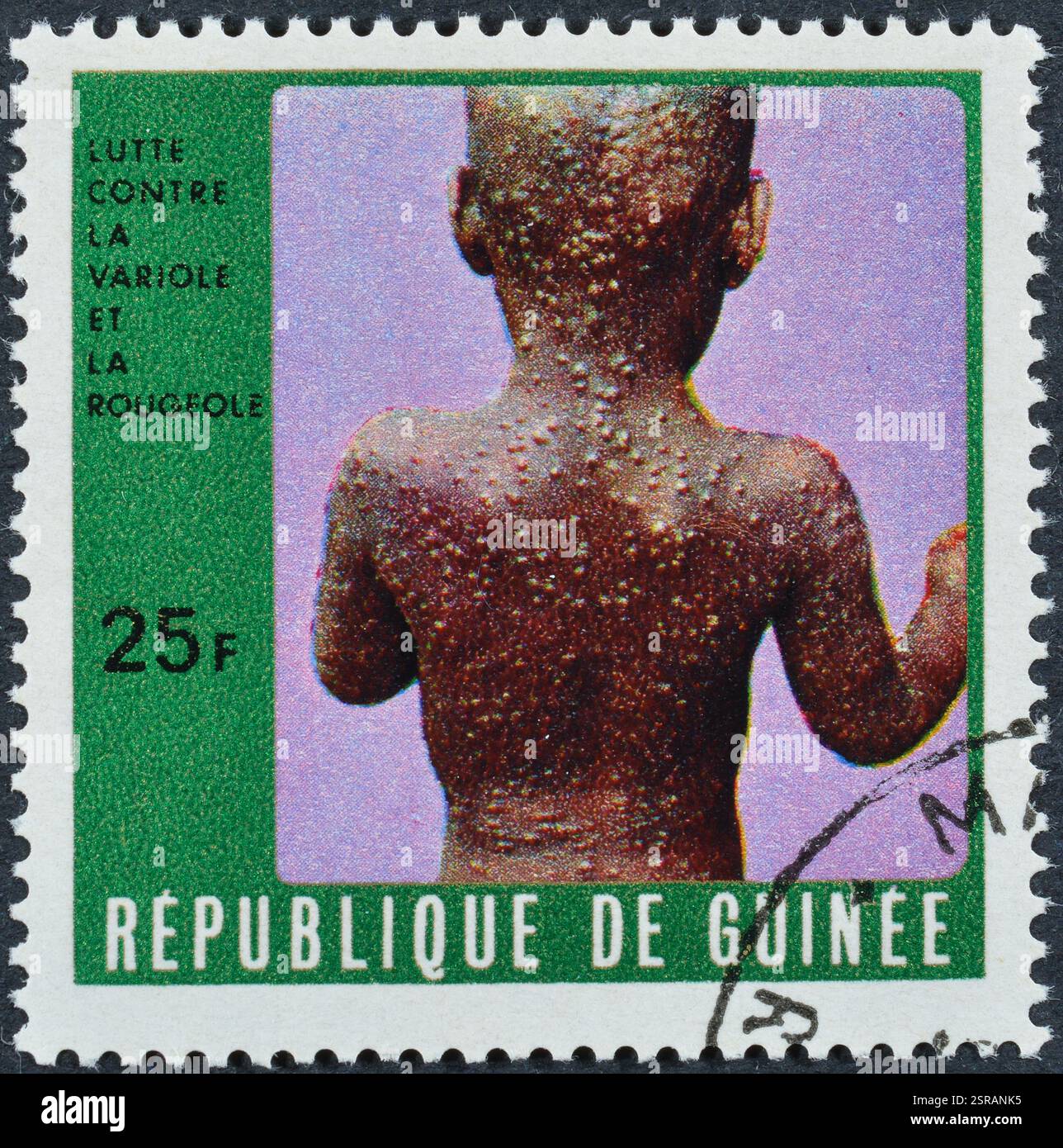 Cancelled postage stamp printed by Guinea, that shows Child with ...