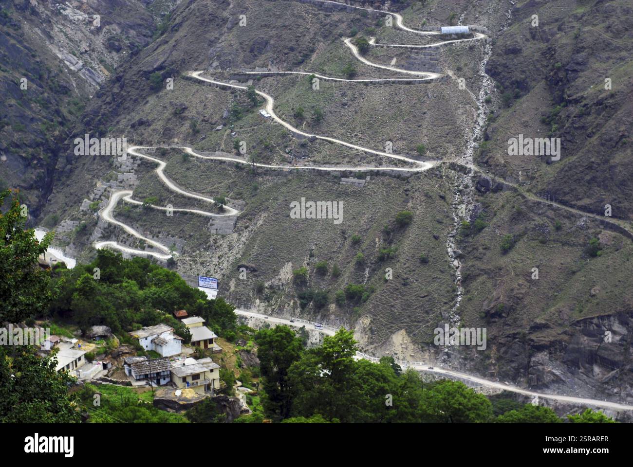 Zigzag road cutting through mountains at Joshimath on route to ...