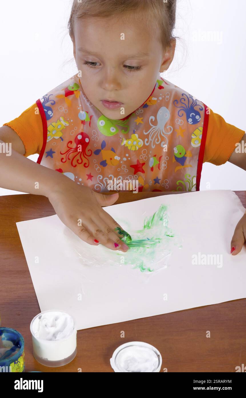 Paint with finger paints Stock Photo - Alamy