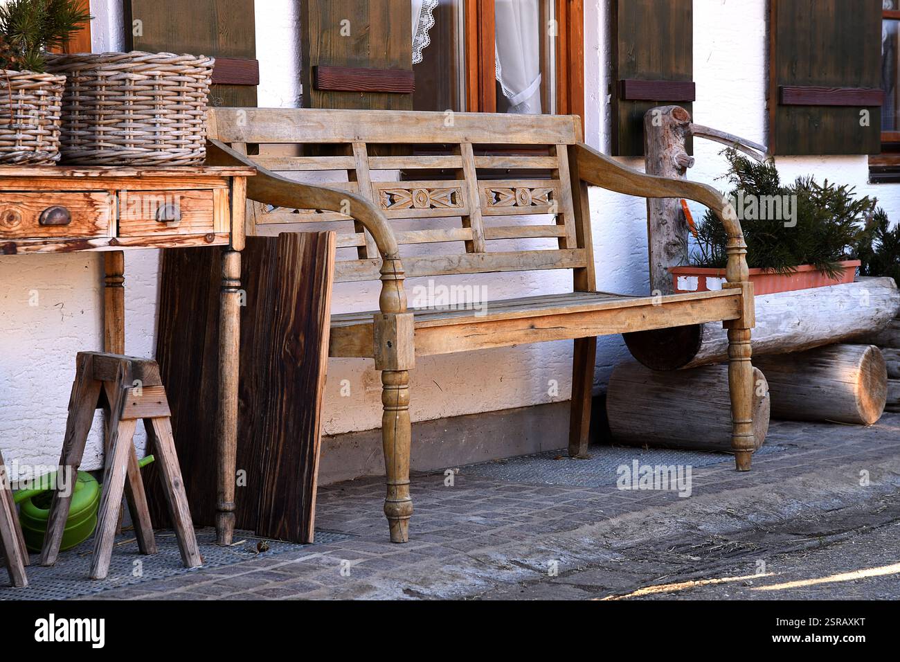 The photographs show an old wooden bench Stock Photo - Alamy