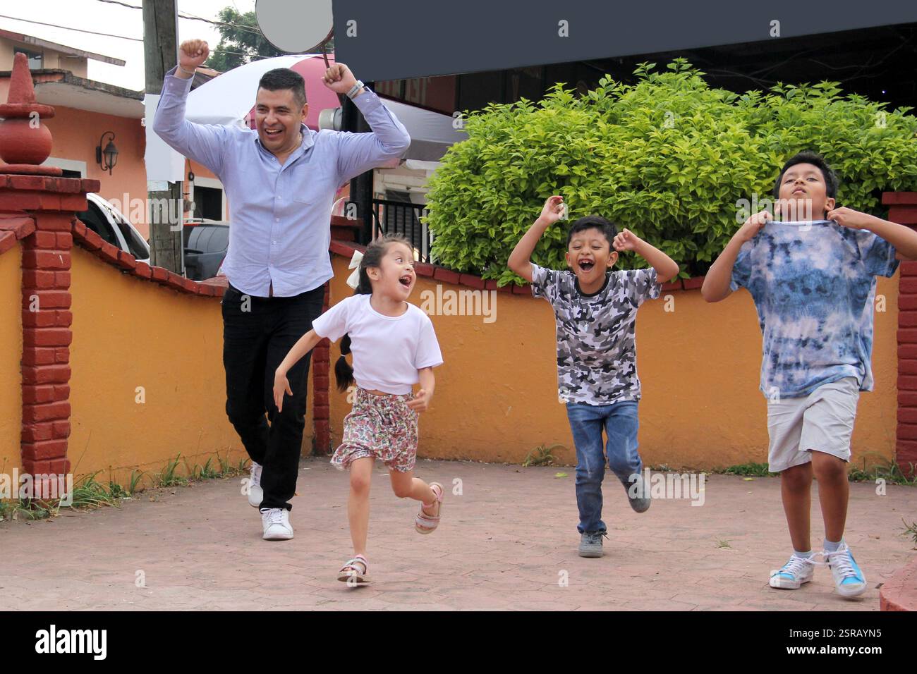 Divorced single dad plays with his two dark-skinned Latino sons and ...