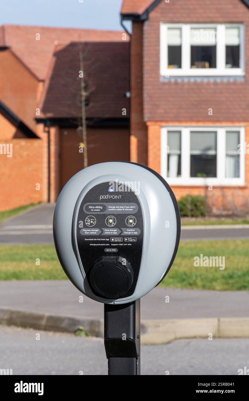 A PodPoint charger on a new sustainable housing estate for charging ...