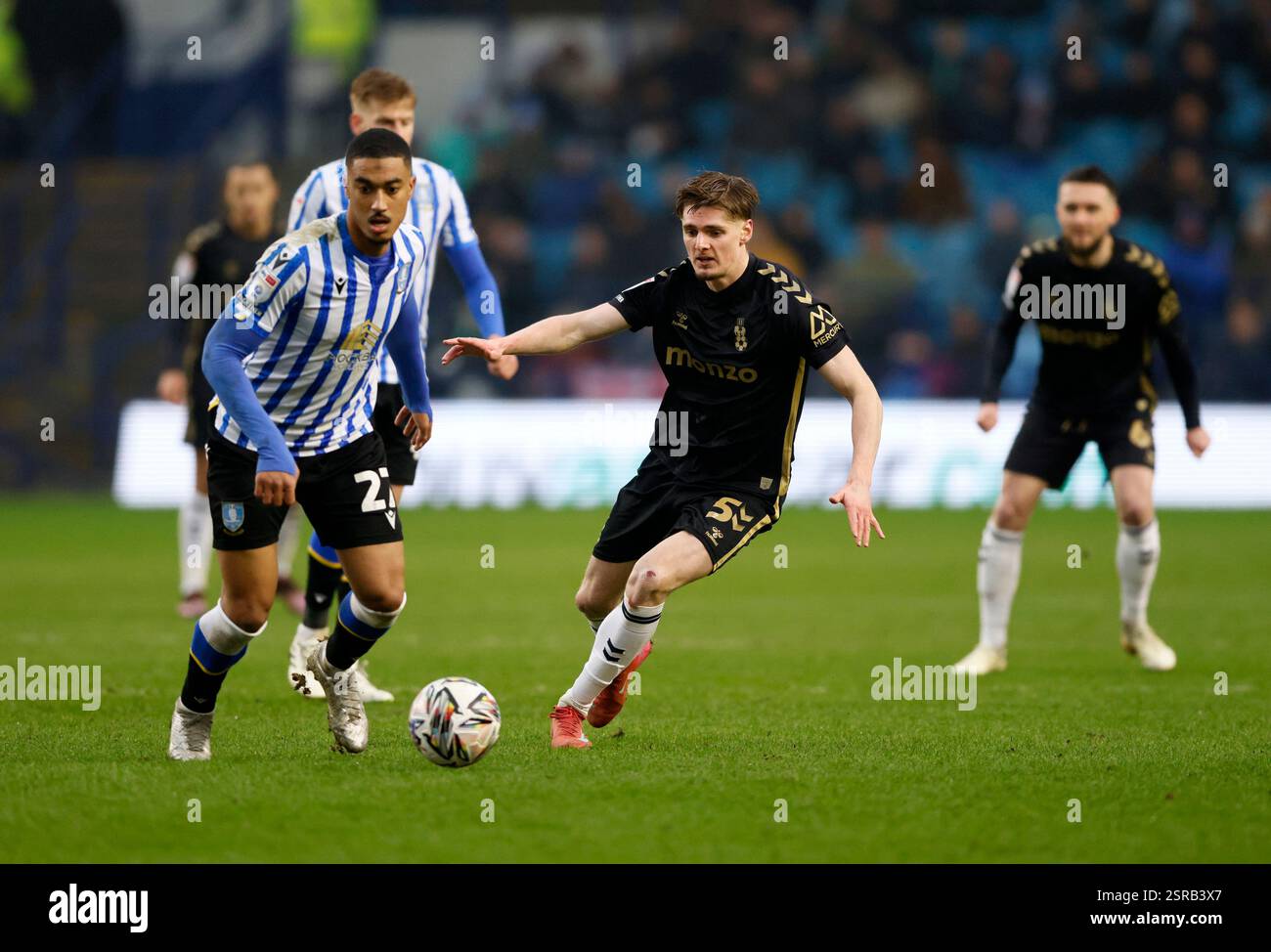 Sheffield Wednesday's Yan Valery (left) and Coventry City's Jack Rudoni ...