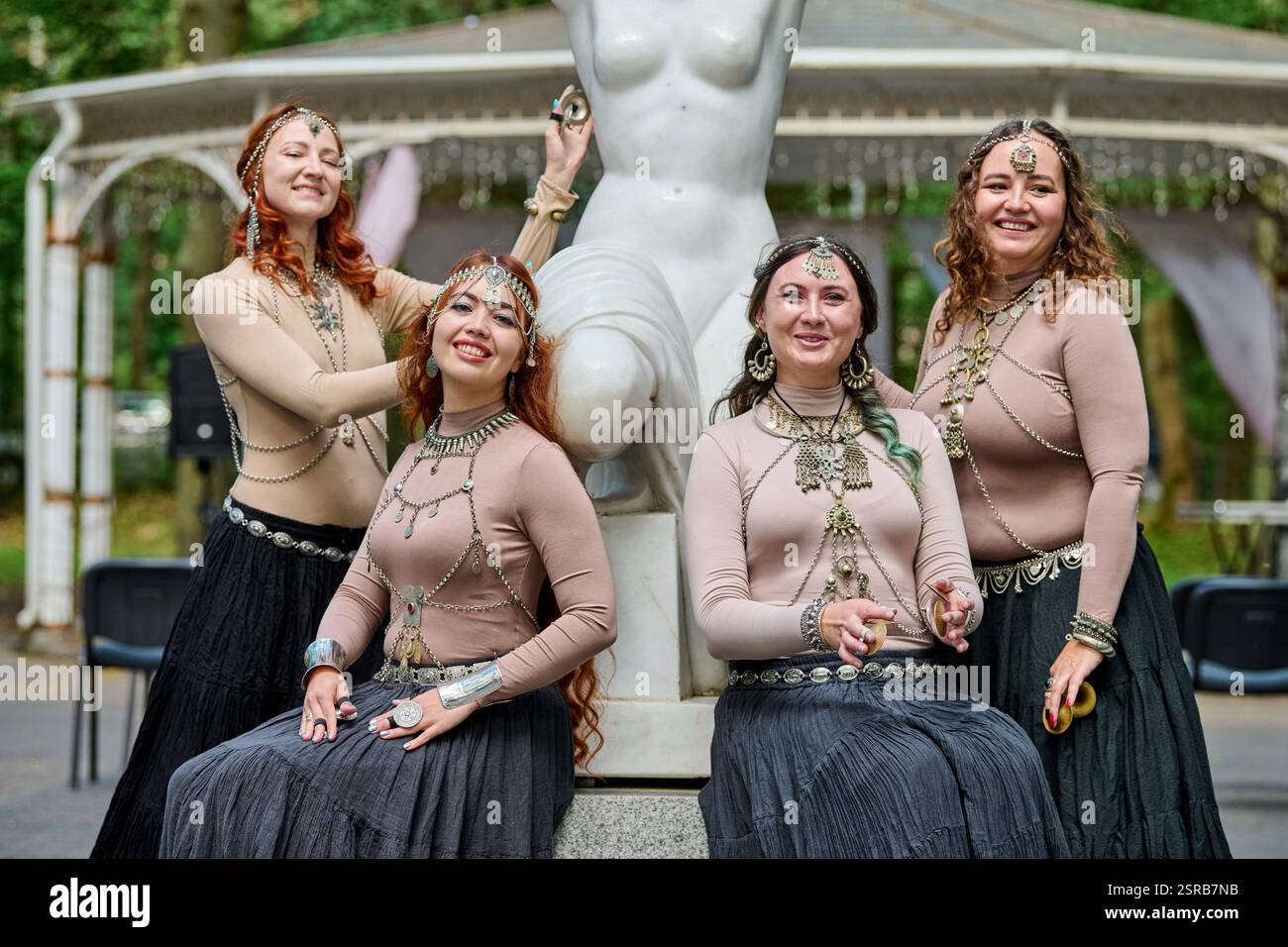 Kaliningrad, Russia - 10.08.2024 - Four young white women in tribal ...