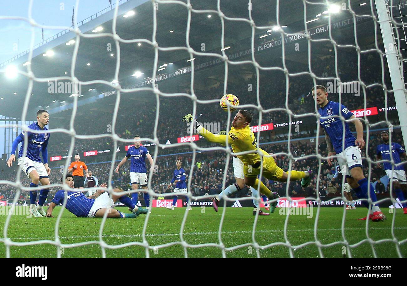 Ipswich Town goalkeeper Alex Palmer (centre) makes a save during the ...