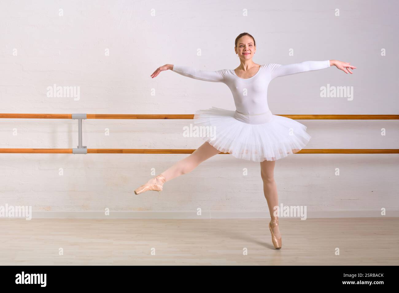 Young female ballerina, light-brown hair, caucasian, gracefully ...