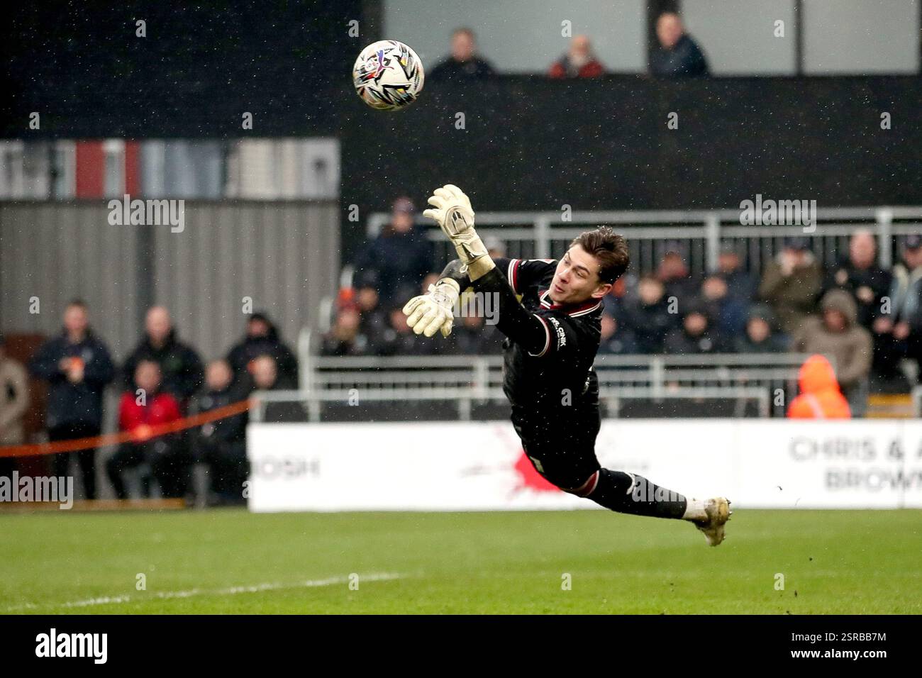 Sheffield United goalkeeper Michael Cooper saves a shot on goal during ...
