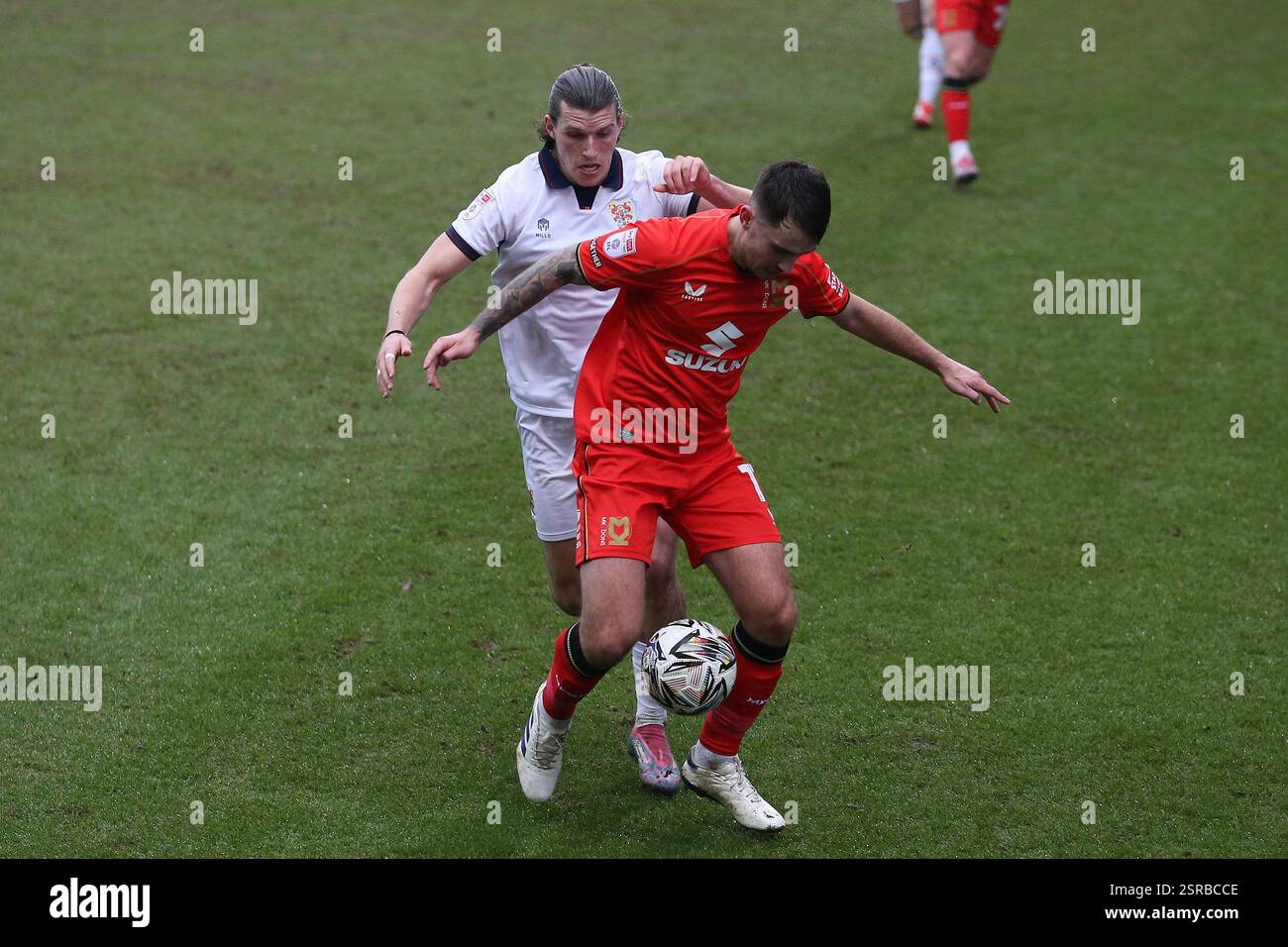 Birkenhead, UK. 15th Feb, 2025. Luke Offord (17) of Milton Keynes Dons ...