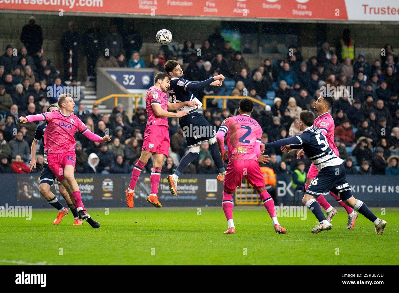 Millwall's Mihailo Ivanovic (centre right) headers the ball during the ...