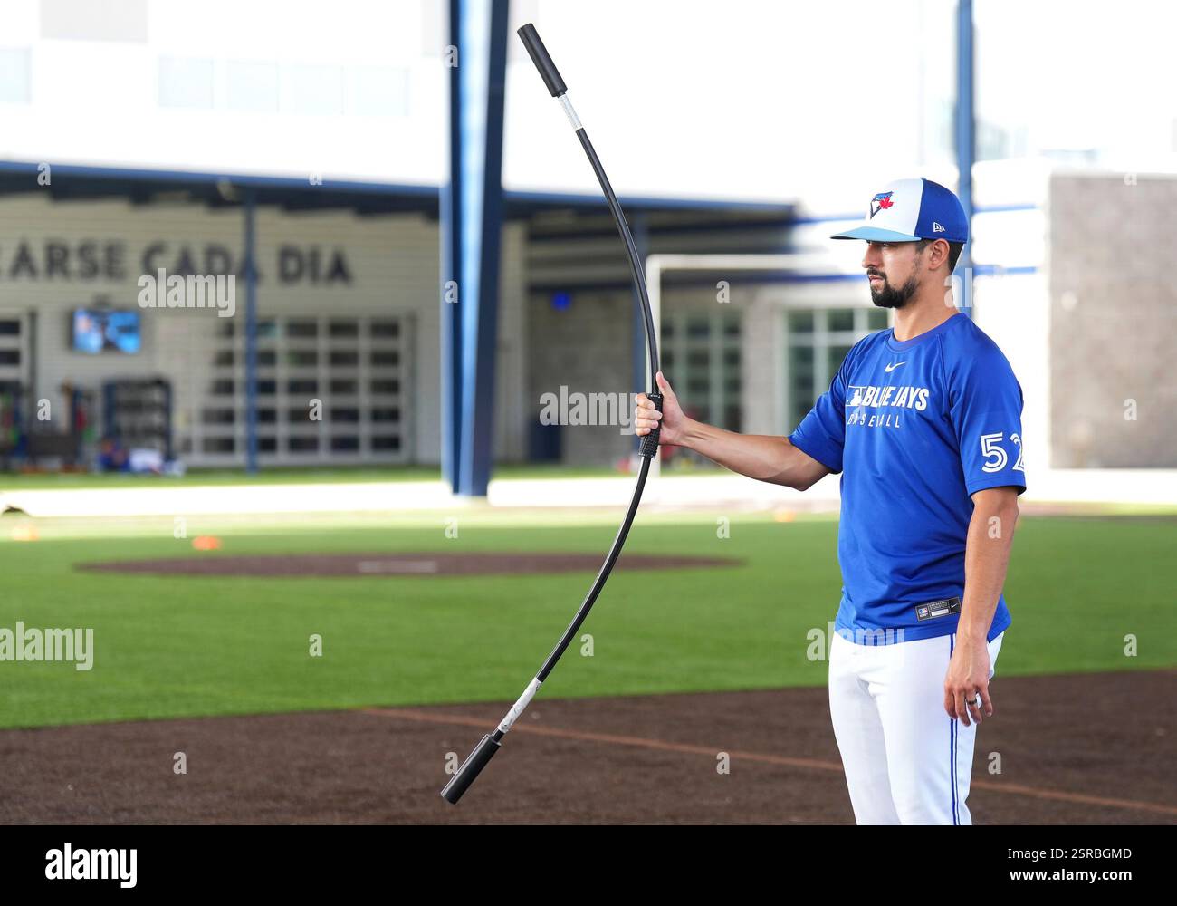 Toronto Blue Jays pitcher Nick Sandlin stretches his arm during spring ...