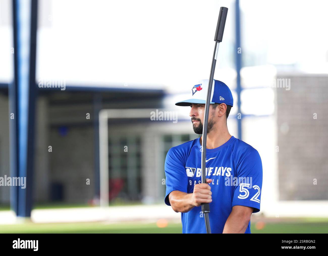 Toronto Blue Jays pitcher Nick Sandlin stretches his arm during spring ...