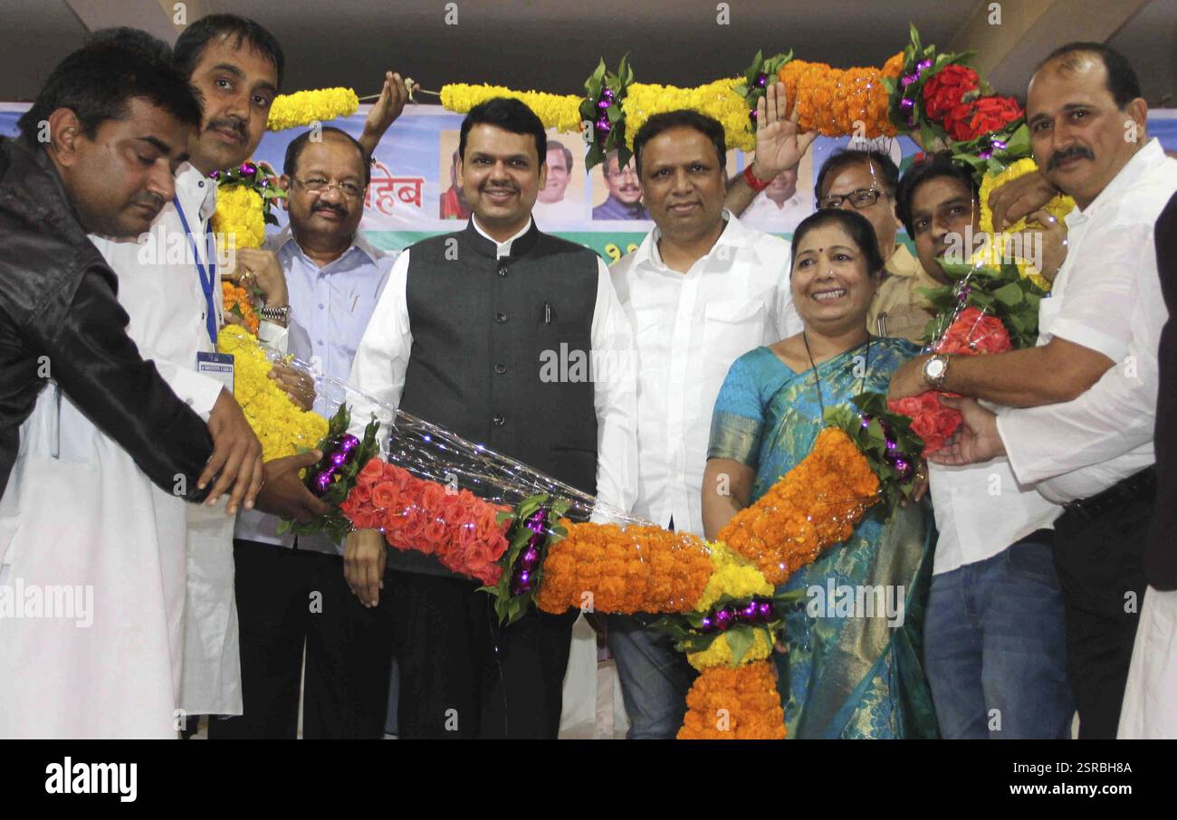 Maharashtra Chief Minister Devendra Fadnavis flanked by MP Gopal Shetty MLA Ashish Shelar ...